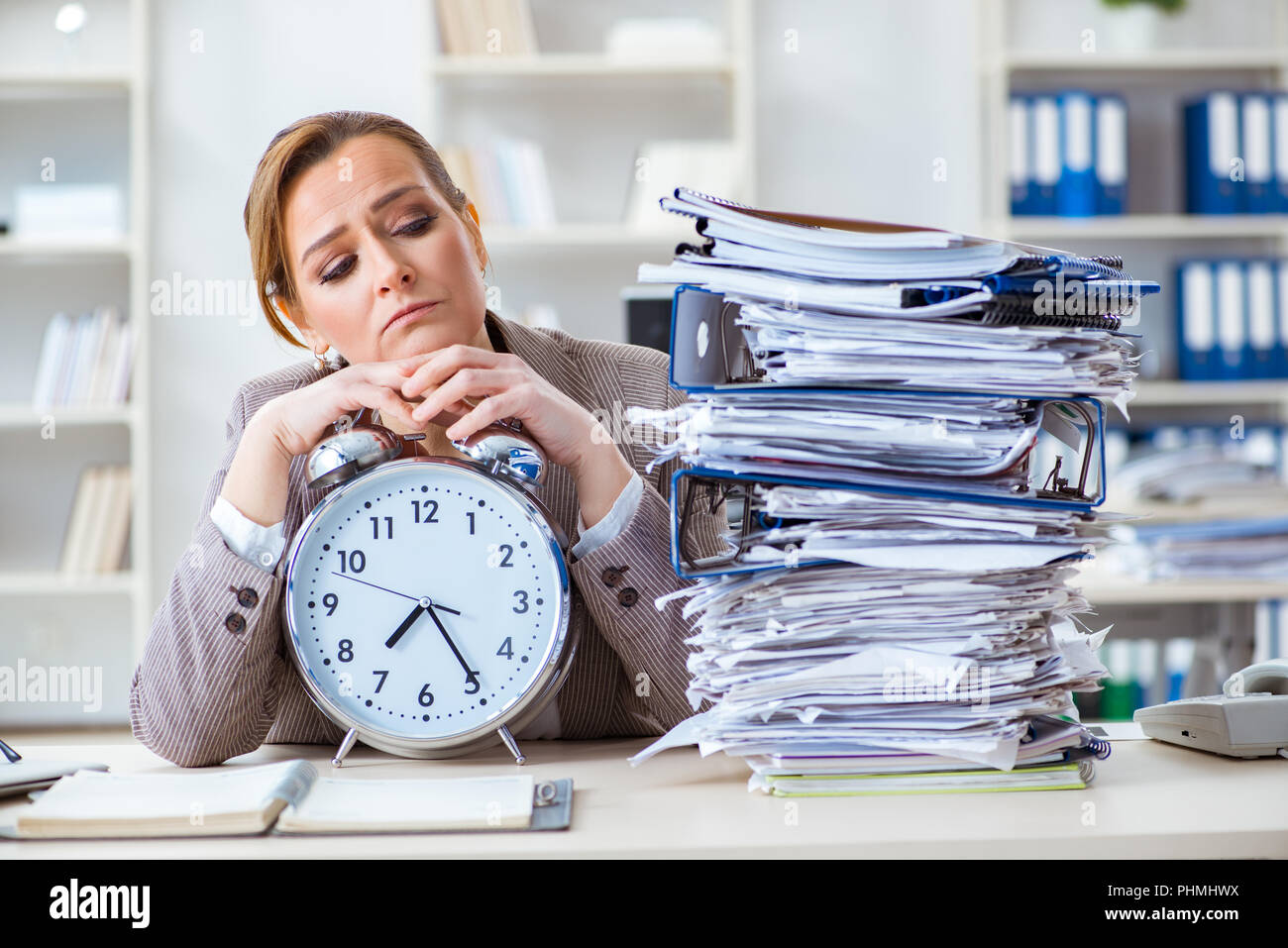 Businesswoman workaholic trying finish hi-res stock photography and ...