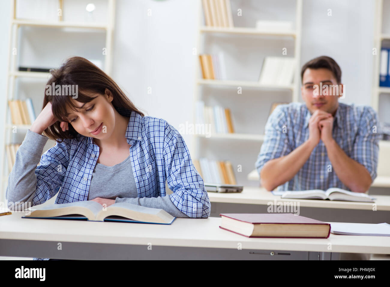 Students sitting and studying in classroom college Stock Photo - Alamy