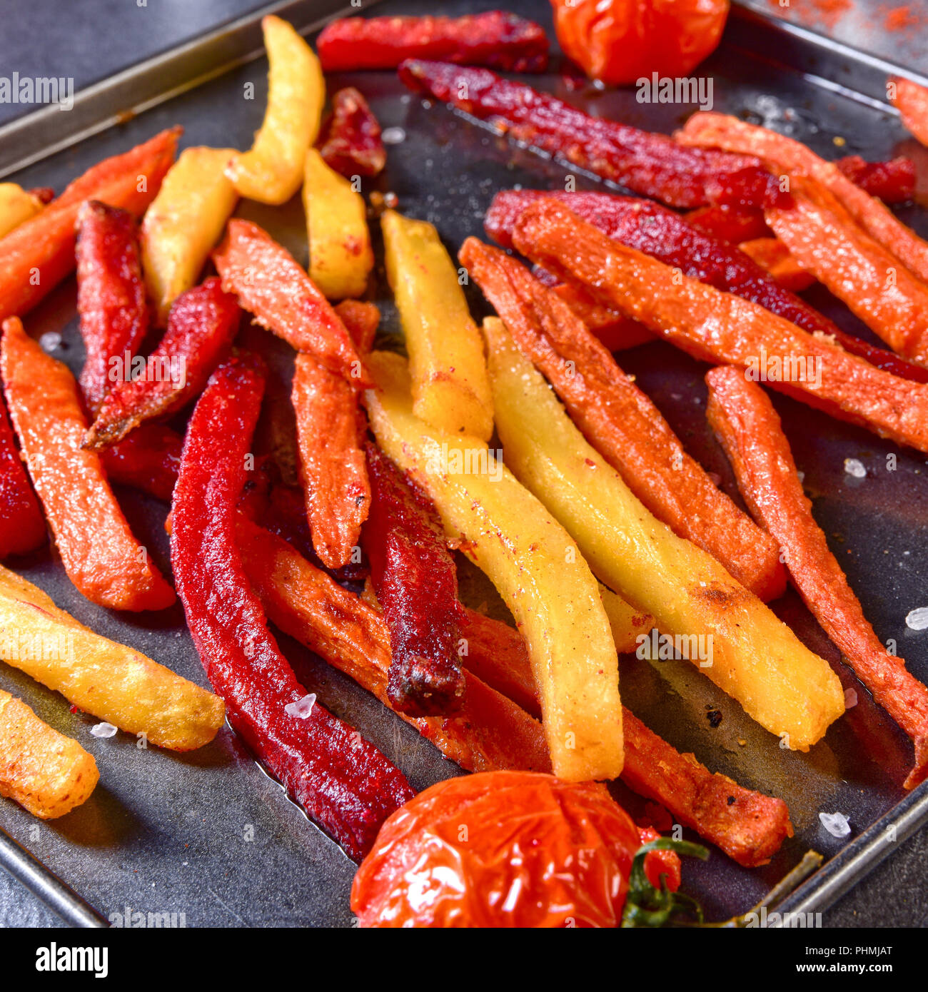 Colorful vegetable fries from the oven Stock Photo - Alamy
