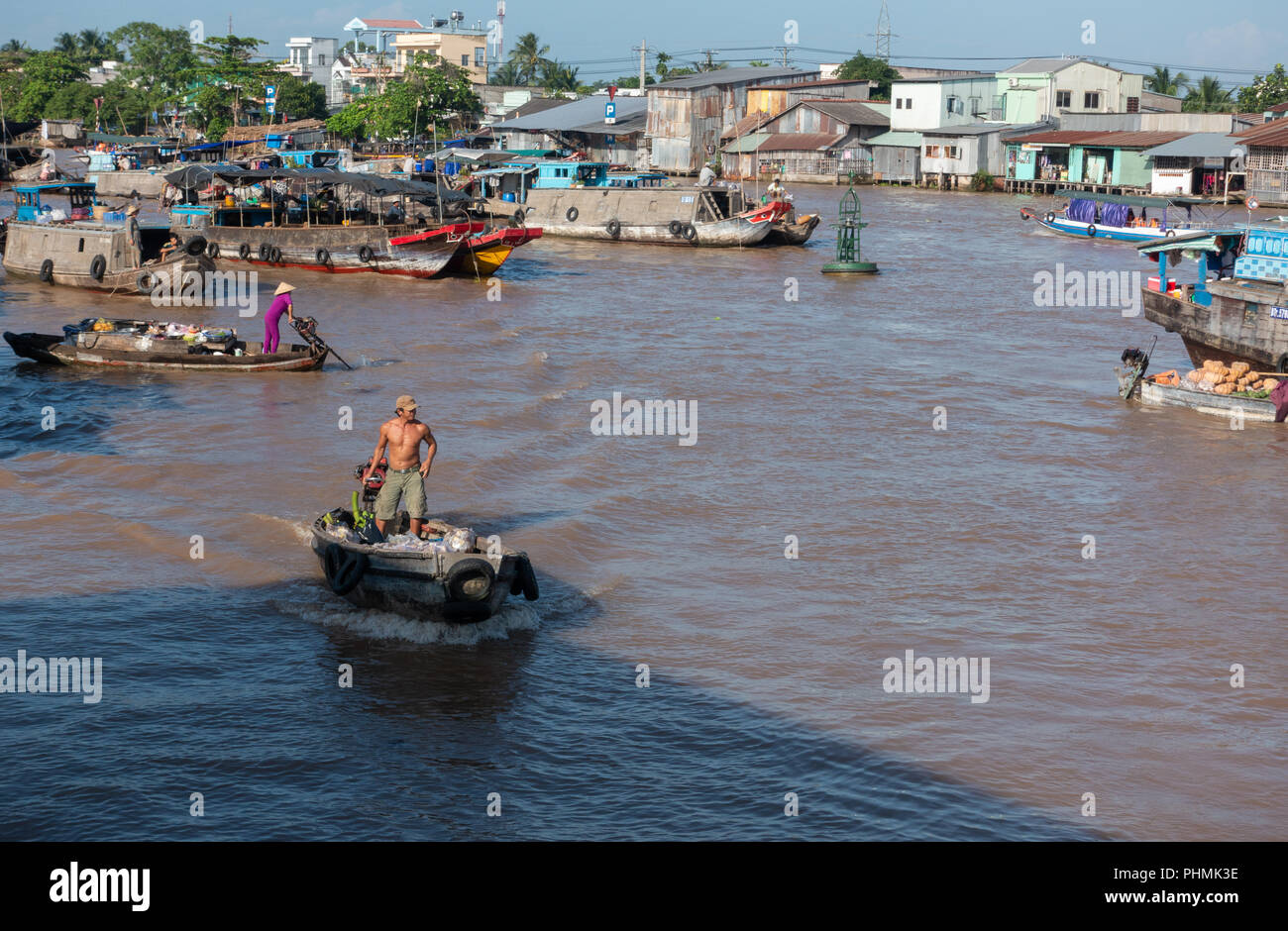 Unidentified people buy and sell on boat, ship in Cai Rang floating ...