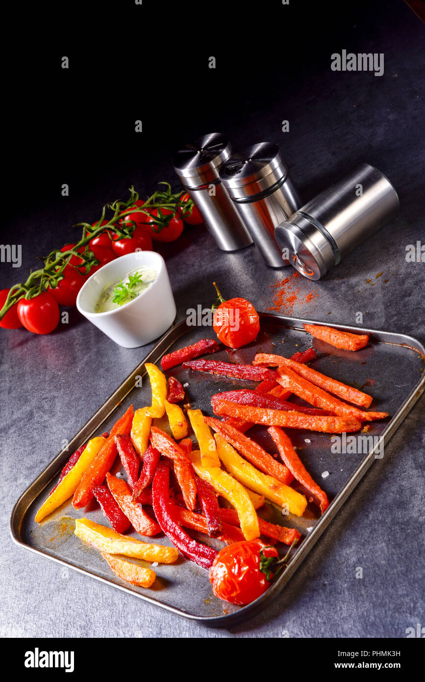 colorful vegetable fries from the oven Stock Photo - Alamy