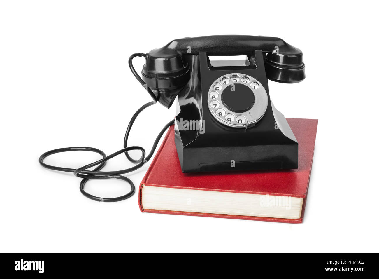 Vintage telephone and book Stock Photo - Alamy