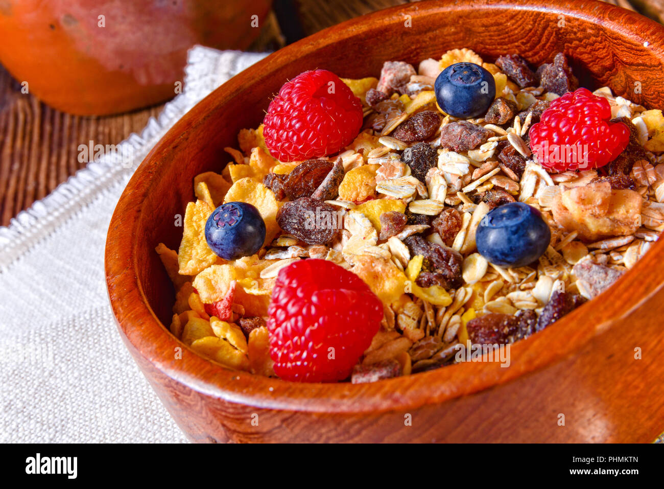 rustic muesli breakfast with forest fruits Stock Photo - Alamy