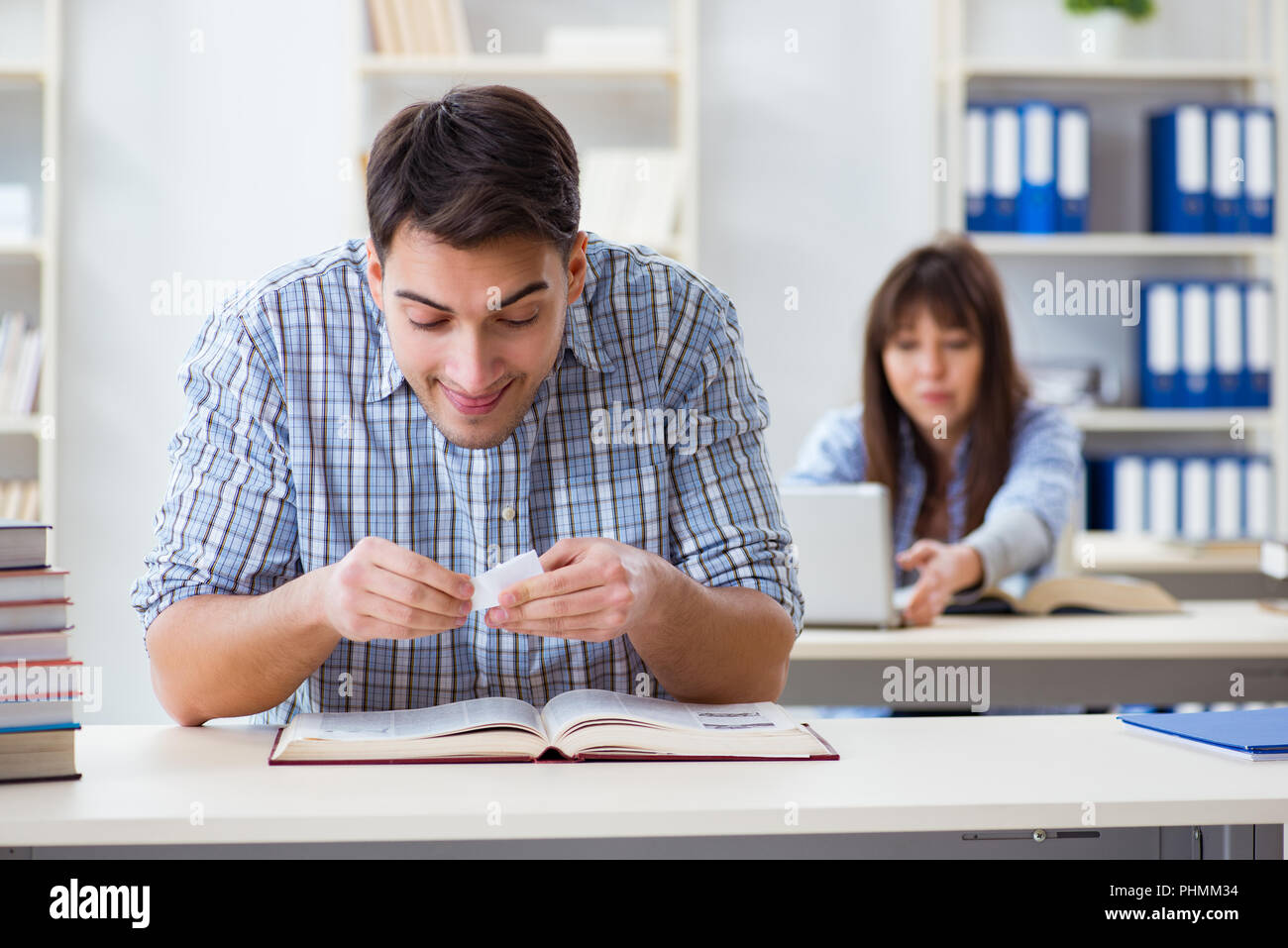 Students sitting and studying in classroom college Stock Photo - Alamy
