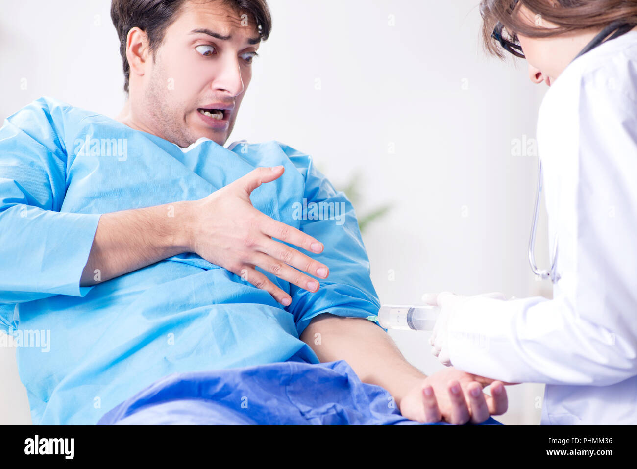 Scared patient hi-res stock photography and images - Alamy