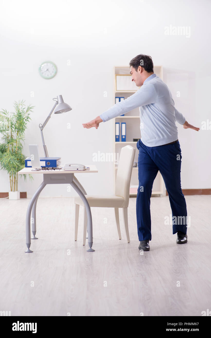 Employee doing stretching exercises hi-res stock photography and images ...