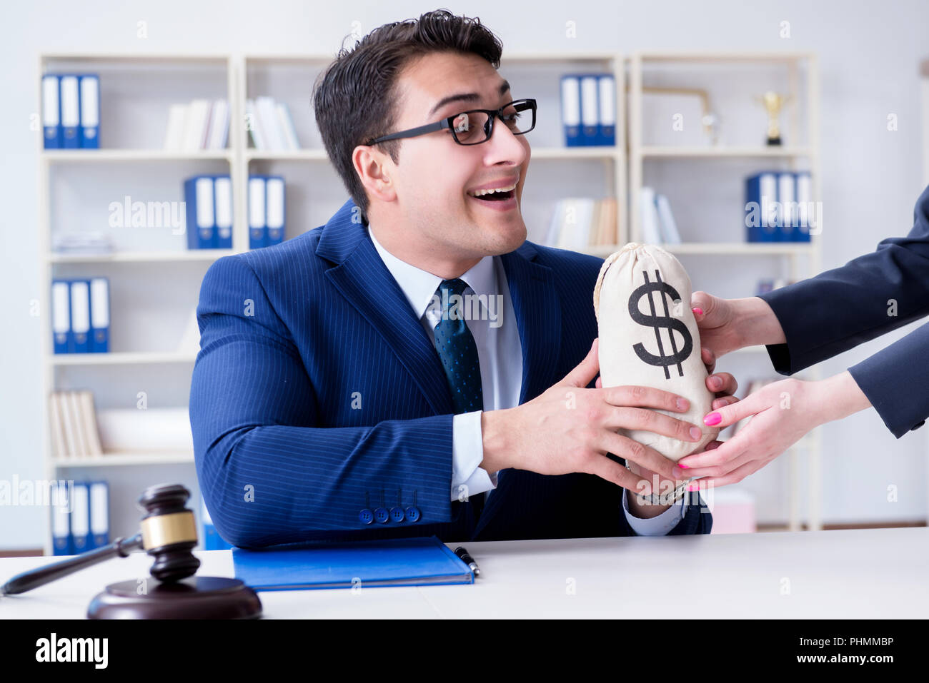 Judge in bribe concept with money Stock Photo - Alamy