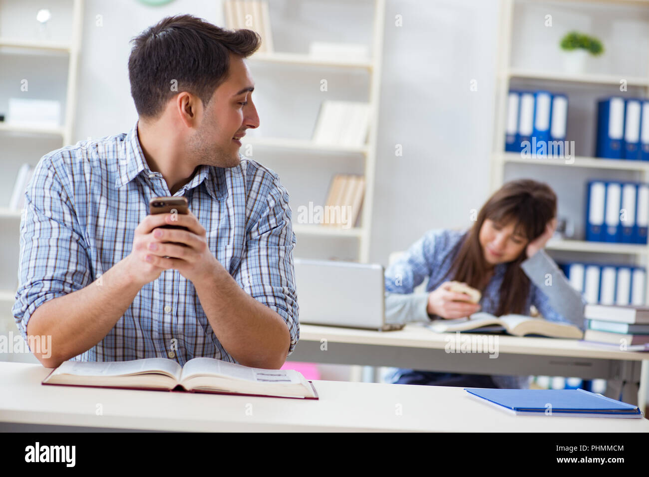 Students sitting and studying in classroom college Stock Photo - Alamy