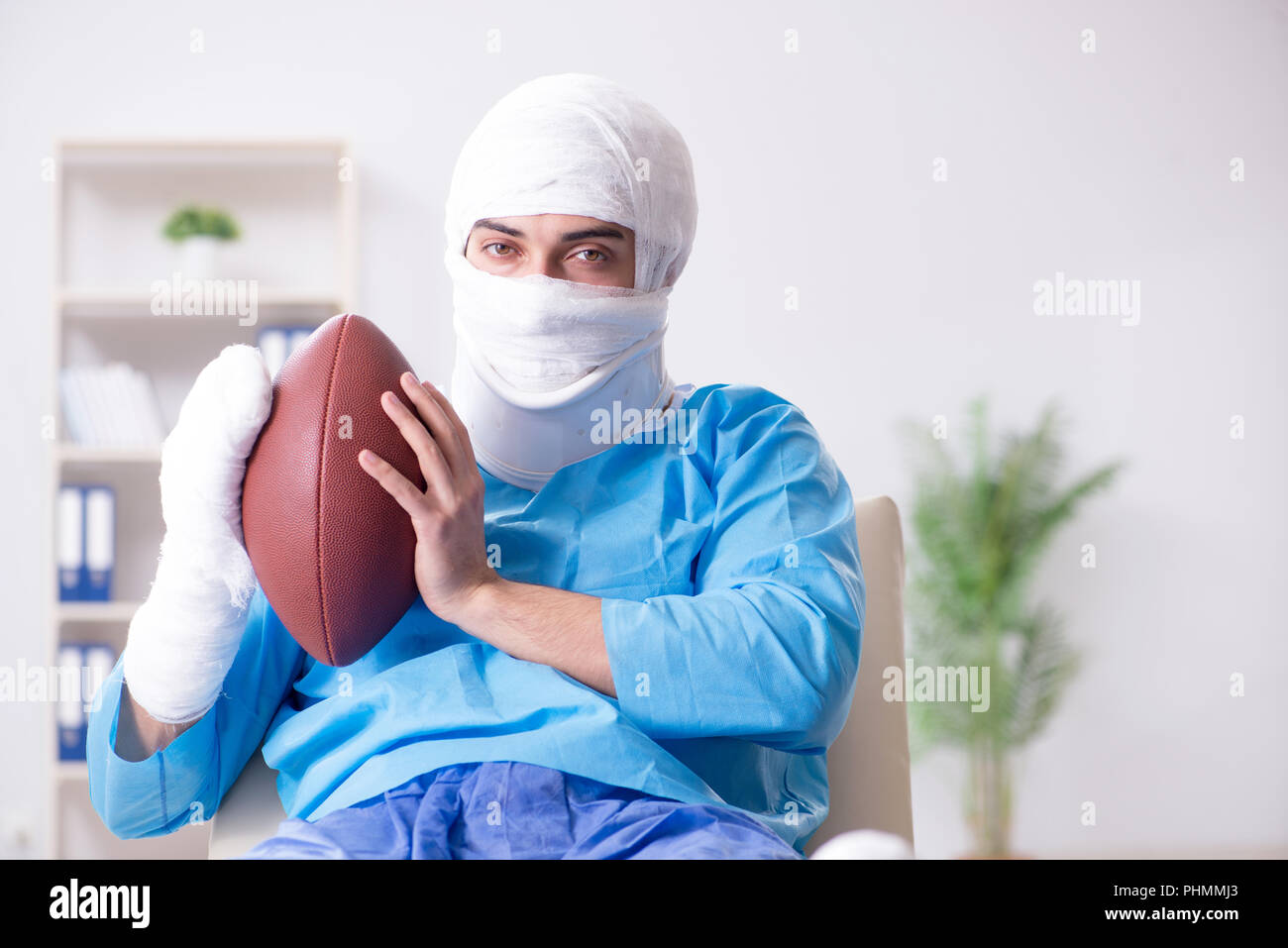 Injured american football player recovering in hospital Stock Photo - Alamy