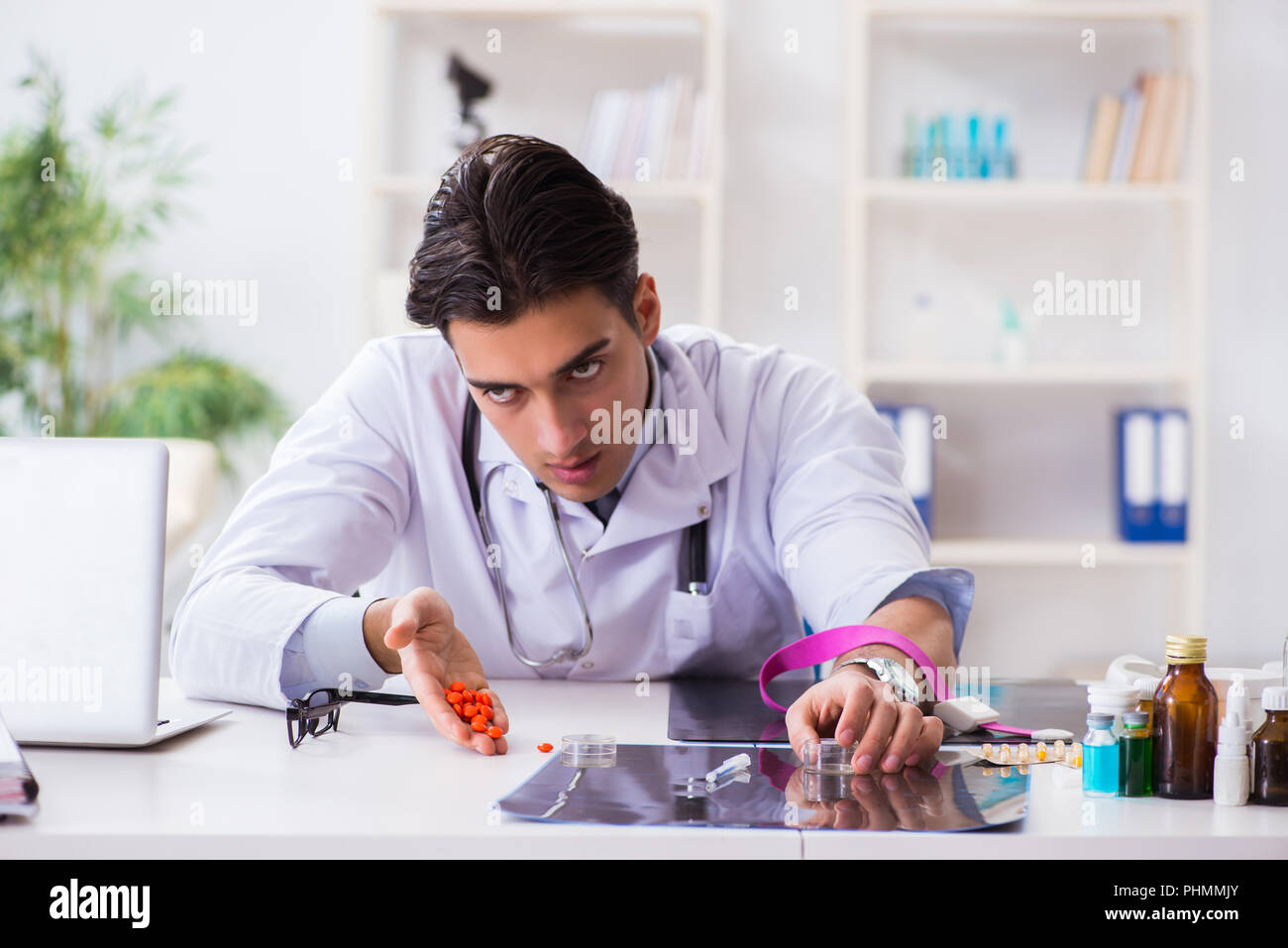 Doctor drug addict in the hospital Stock Photo - Alamy