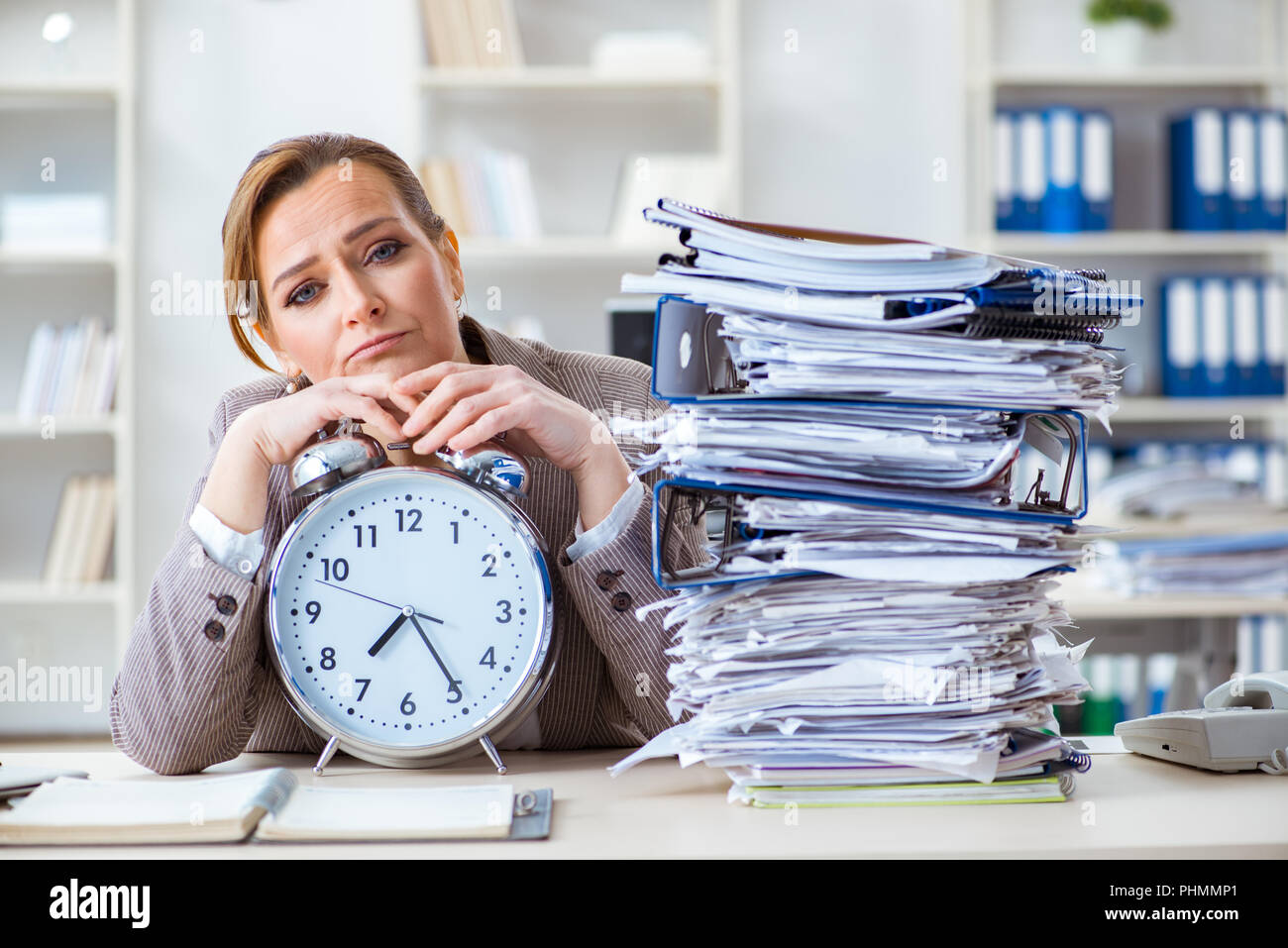 Businesswoman workaholic trying finish hi-res stock photography and ...