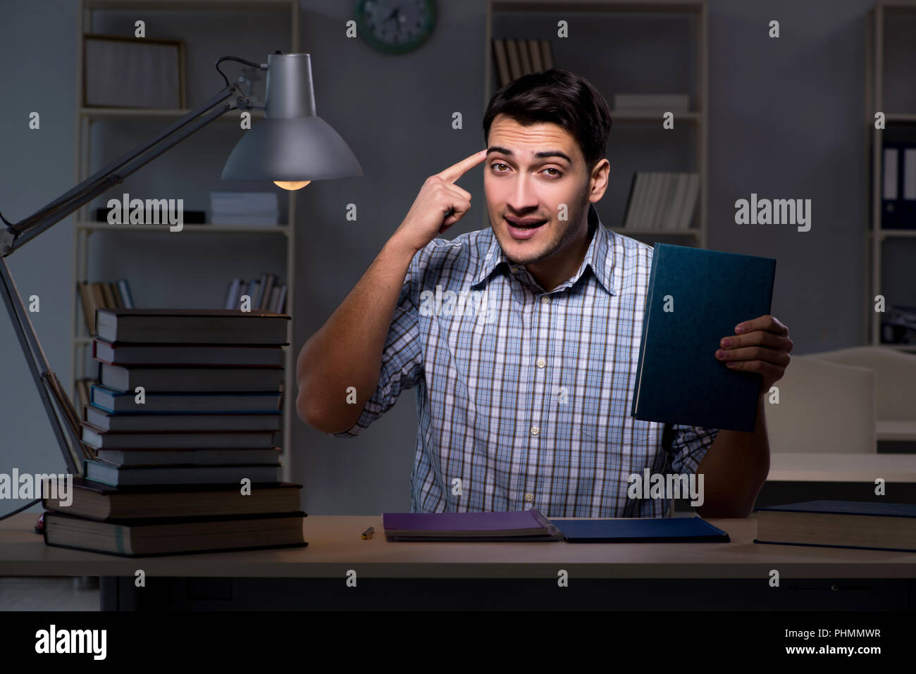 Student preparing for exams late at night Stock Photo - Alamy