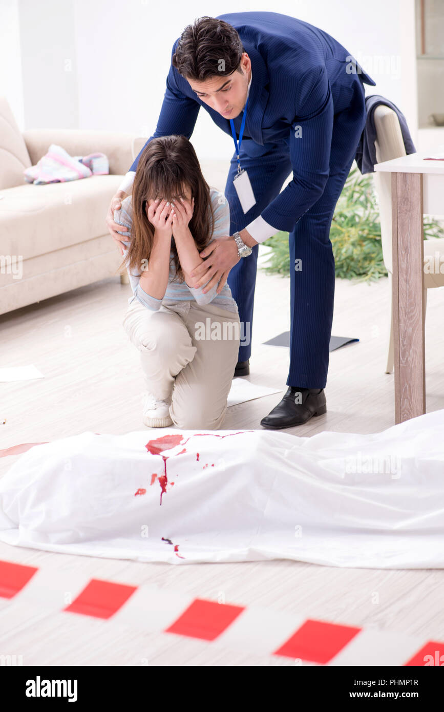 Victim wife at the scene on murder Stock Photo - Alamy