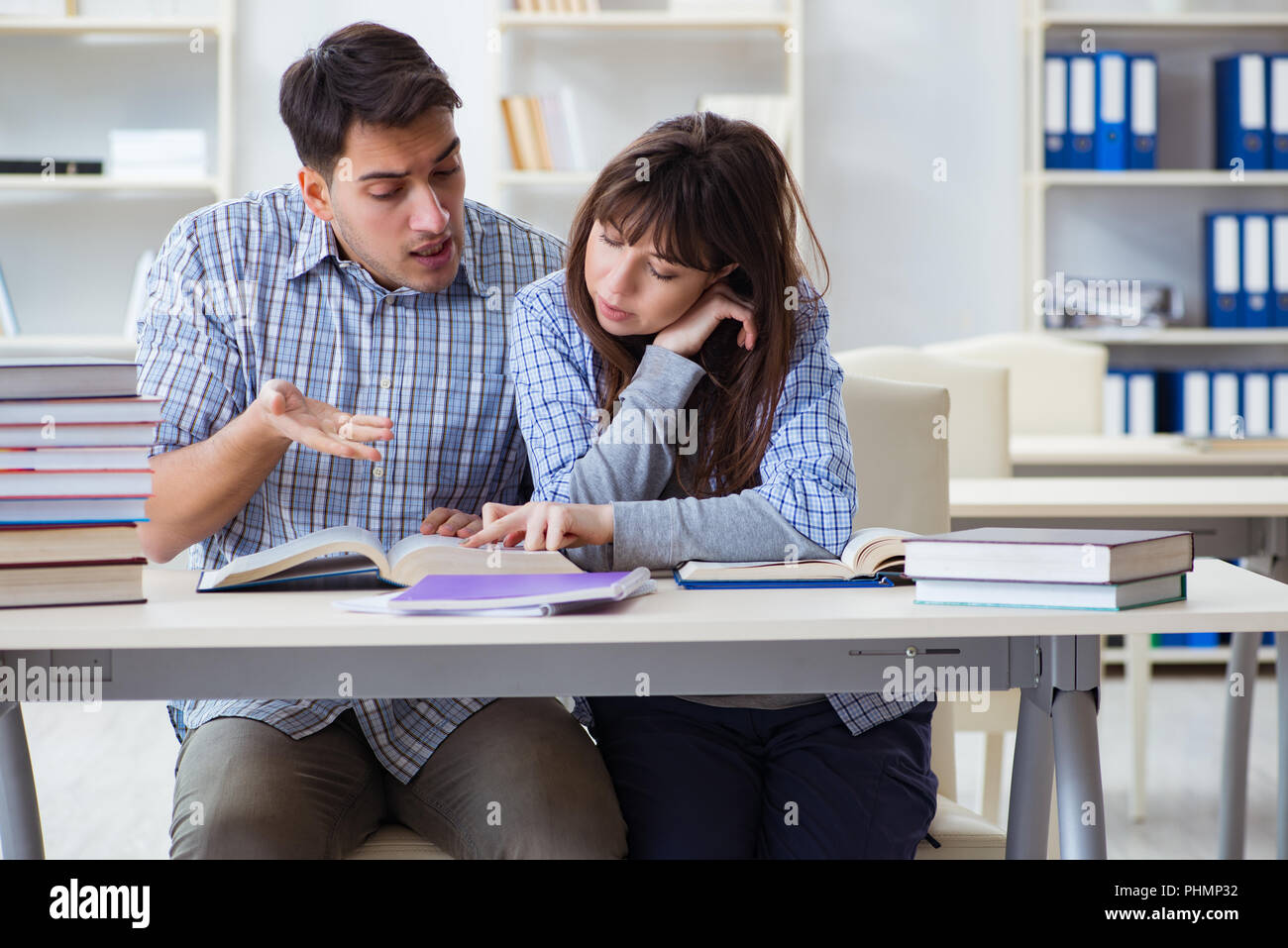 Students sitting and studying in classroom college Stock Photo - Alamy
