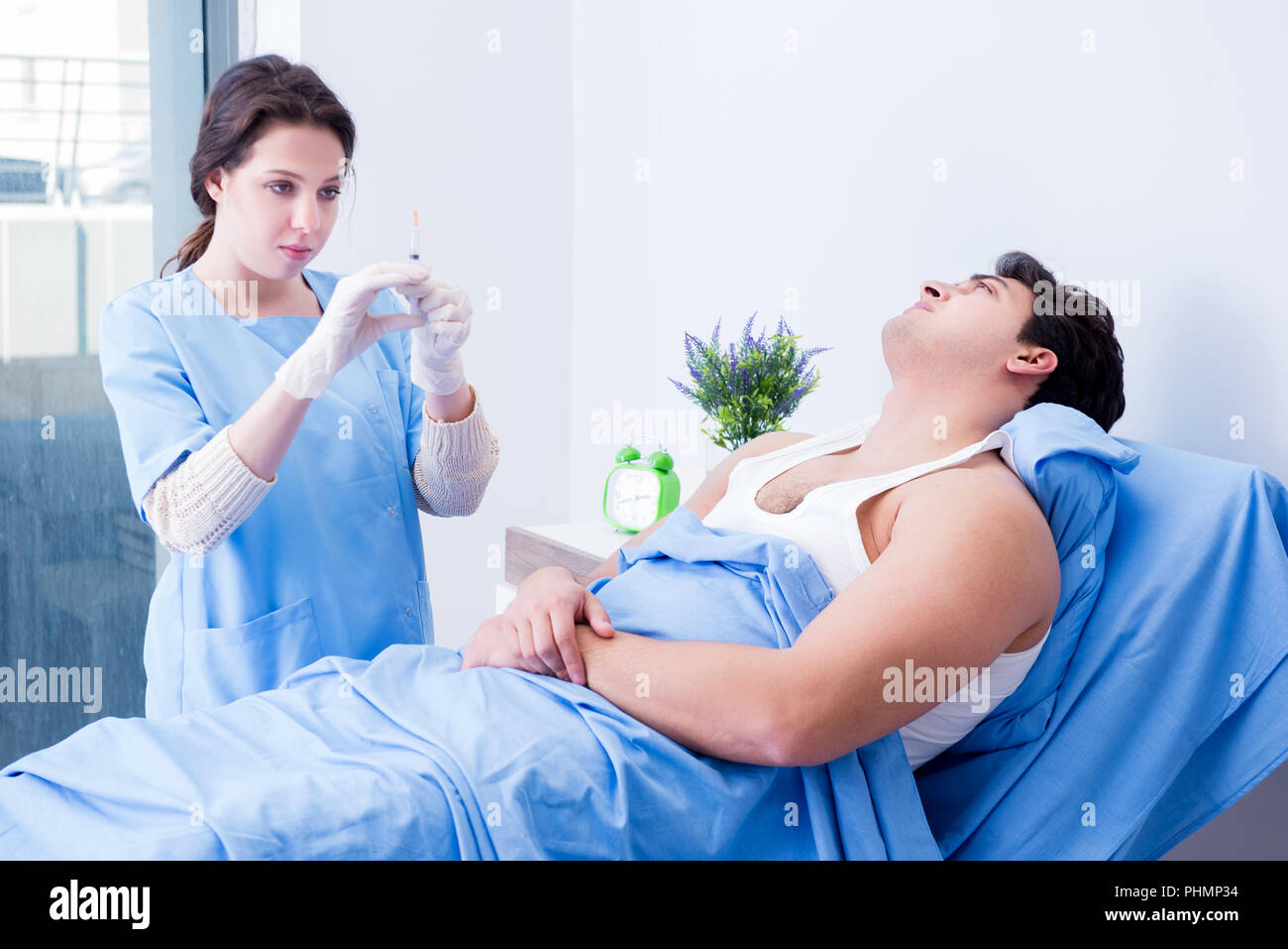 Doctor doing medical injection in hospital room Stock Photo - Alamy
