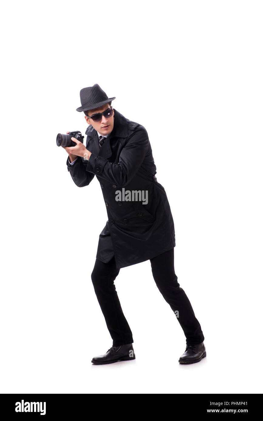 Spy with camera taking pictures isolated on white Stock Photo - Alamy