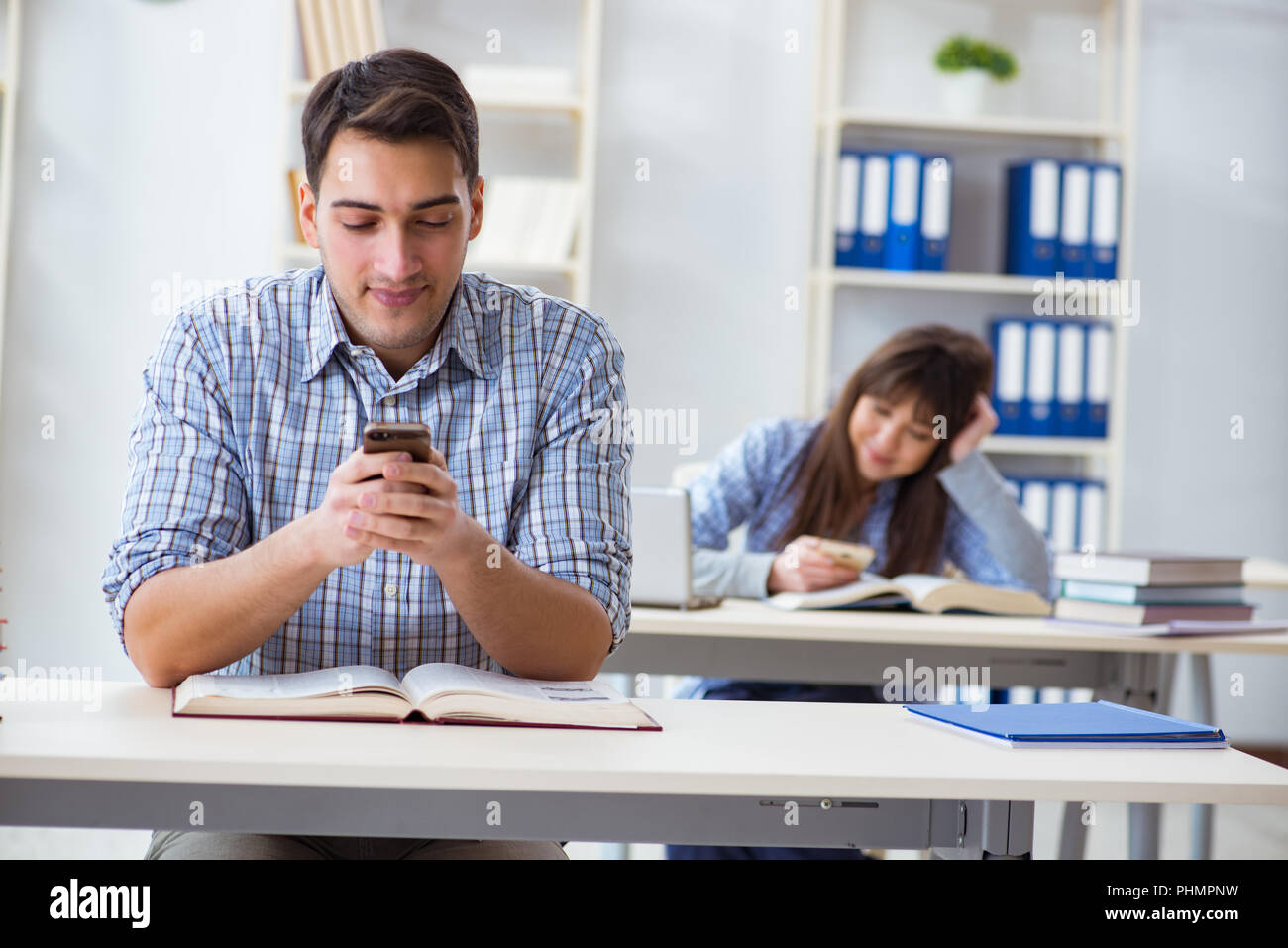 Students sitting and studying in classroom college Stock Photo - Alamy