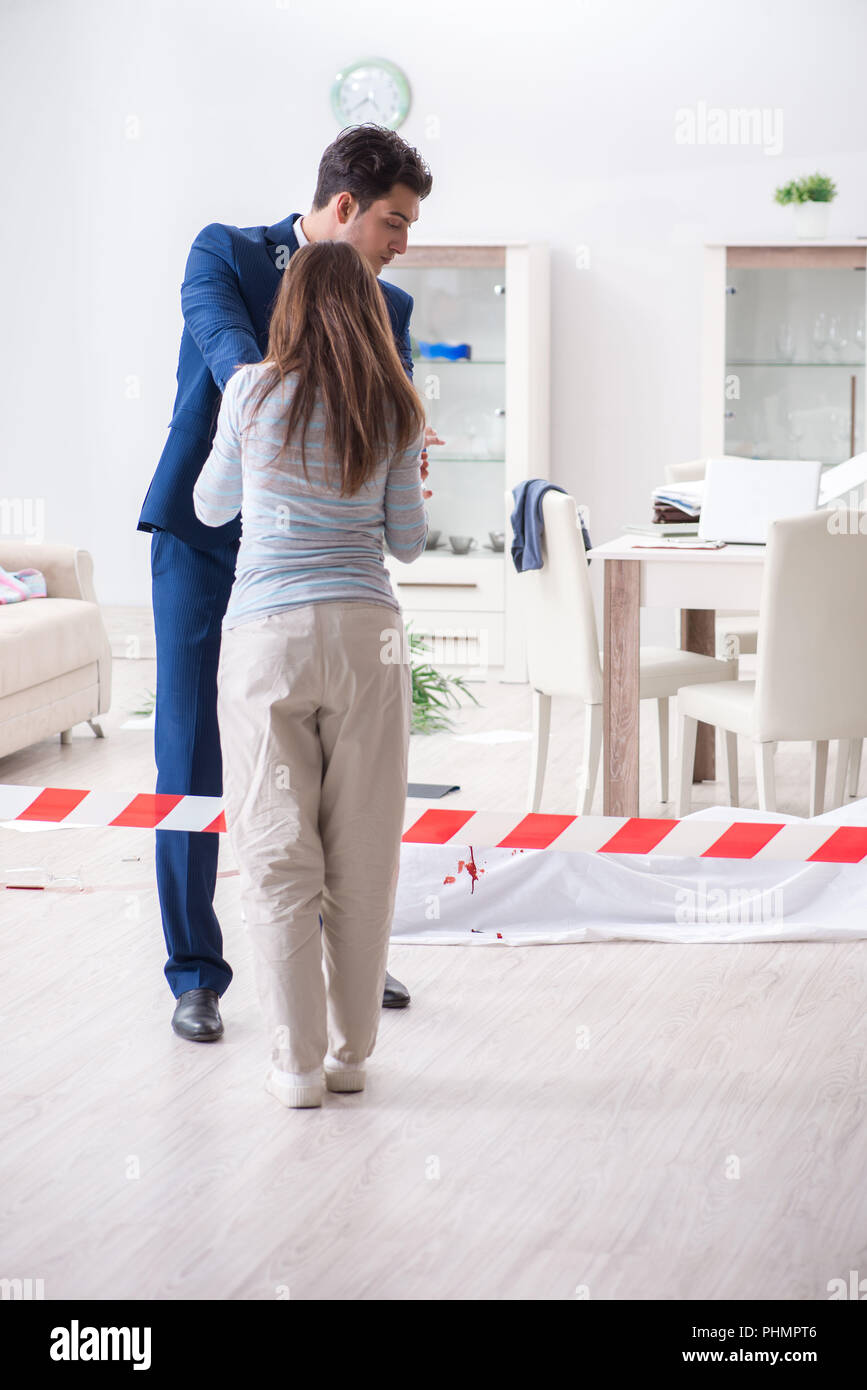 Victim wife at the scene on murder Stock Photo - Alamy