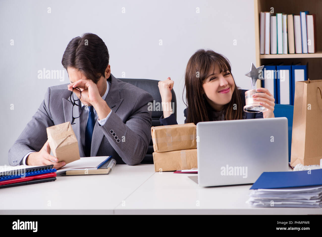 Business people receiving new mail and parcels Stock Photo - Alamy