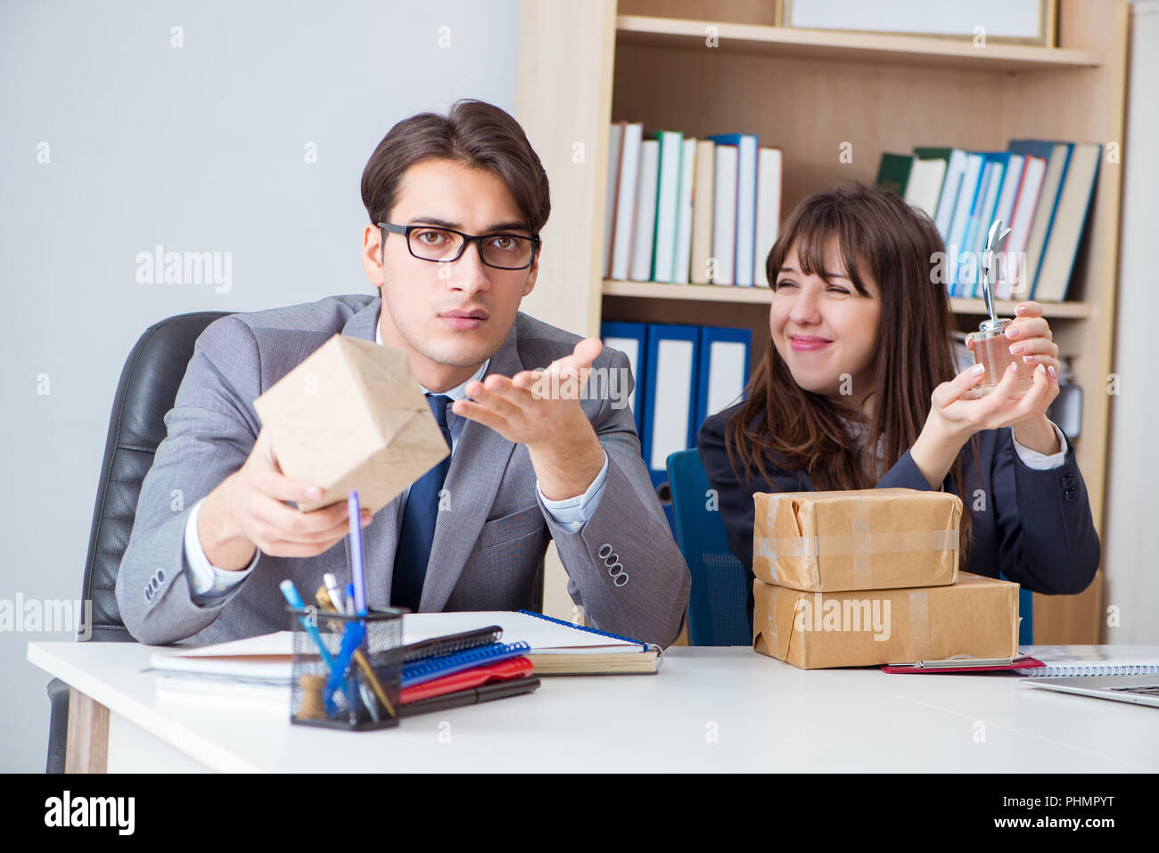 Business people receiving new mail and parcels Stock Photo - Alamy