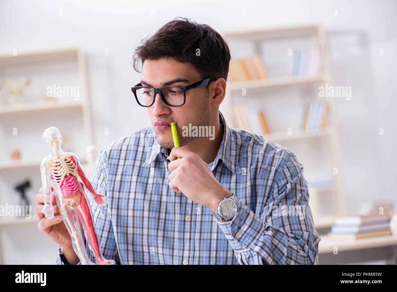 Medical student studying in classroom Stock Photo - Alamy