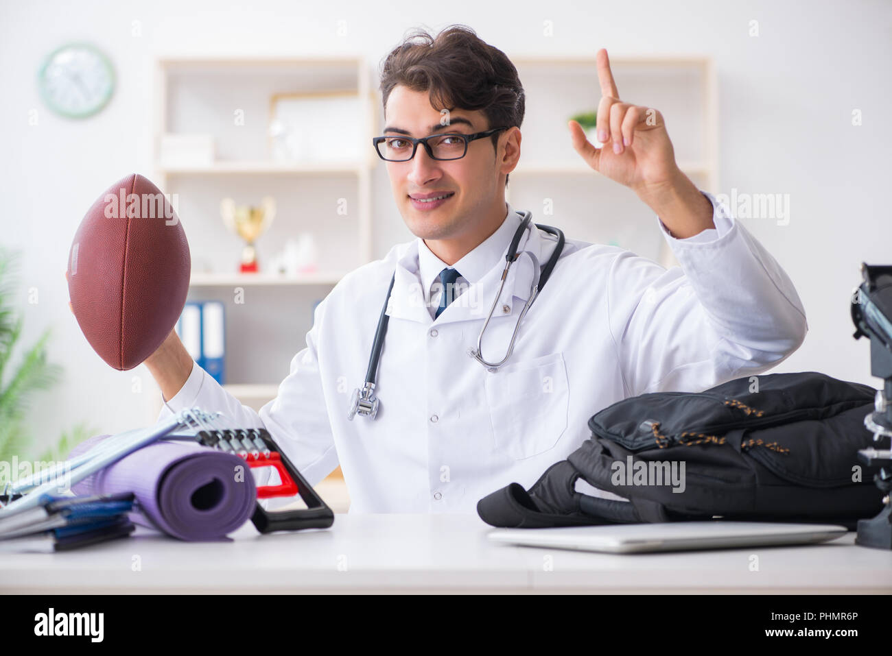 Doctor going to sports during lunch break Stock Photo - Alamy