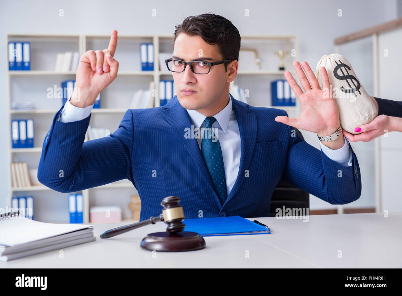 Judge in bribe concept with money Stock Photo - Alamy