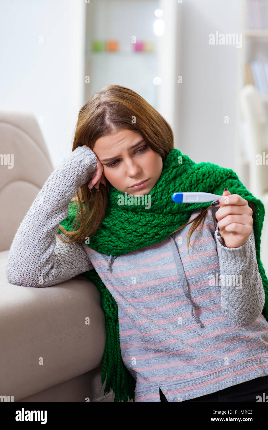 Sick woman suffering from flu at home Stock Photo - Alamy