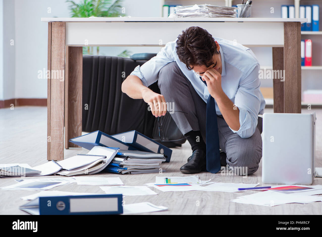 Bankrupt businessman angry in the office floor Stock Photo - Alamy