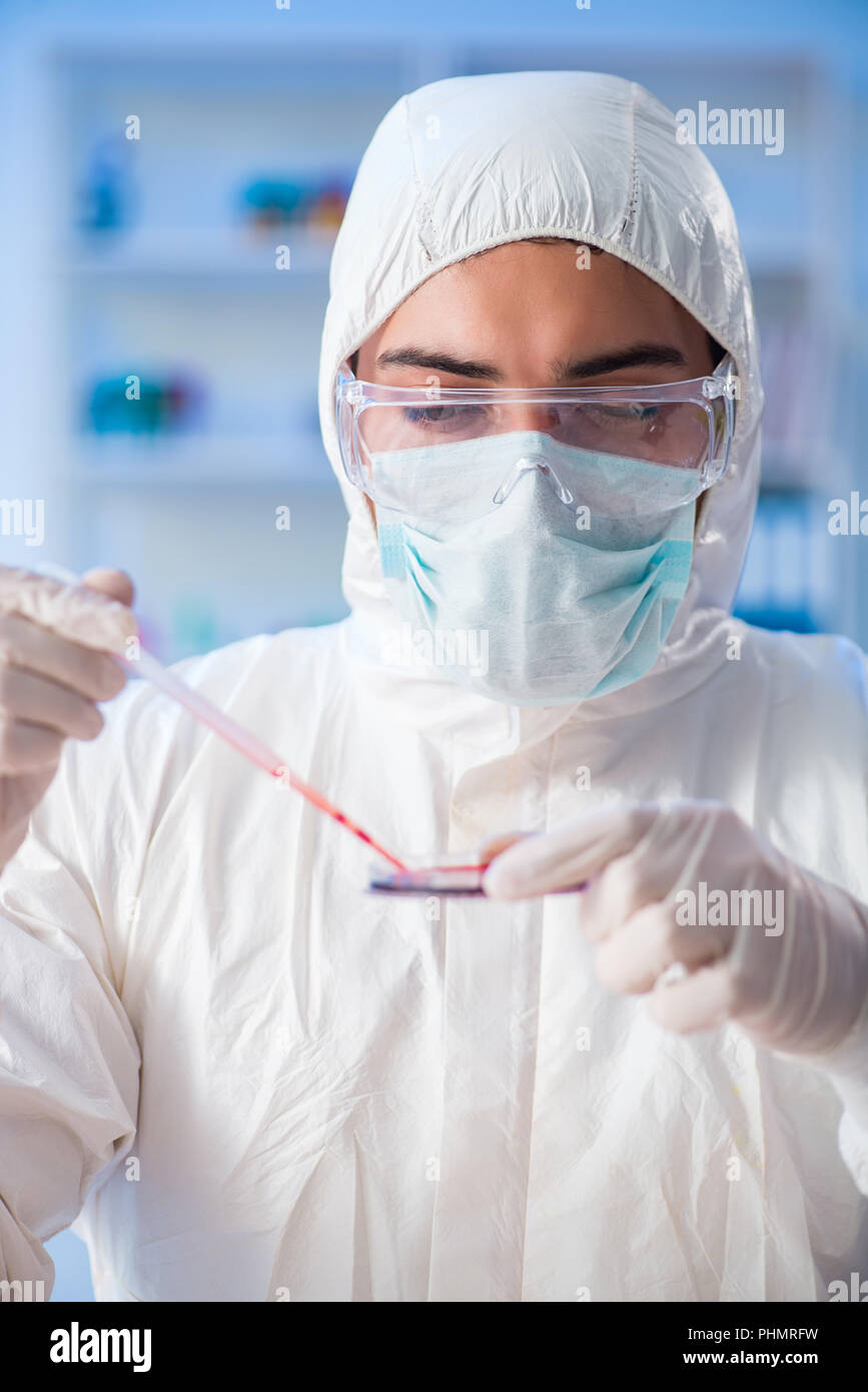 Lab assistant testing blood samples in hospital Stock Photo - Alamy