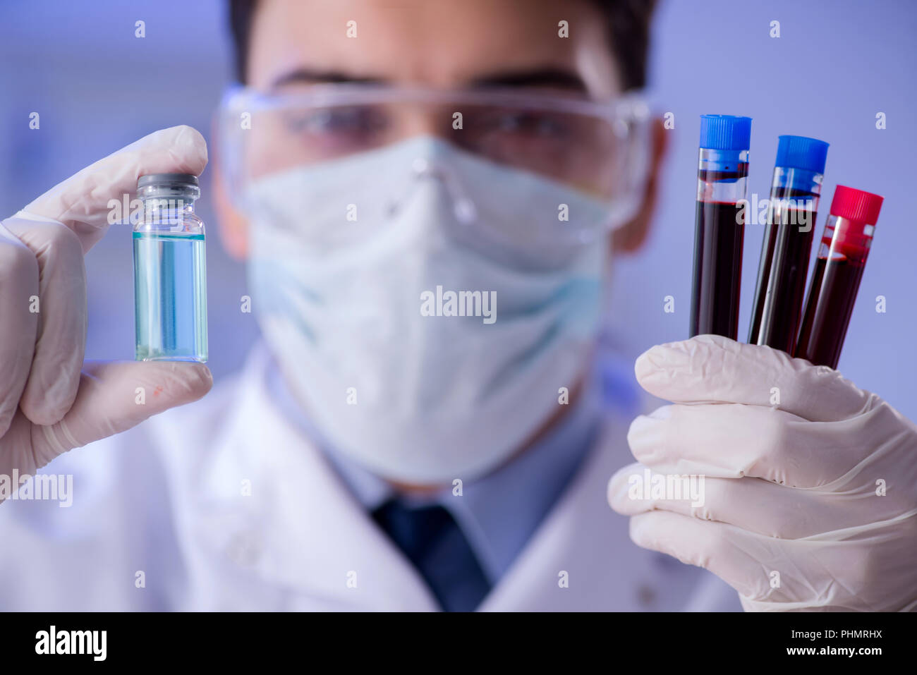 Lab assistant testing blood samples in hospital Stock Photo - Alamy