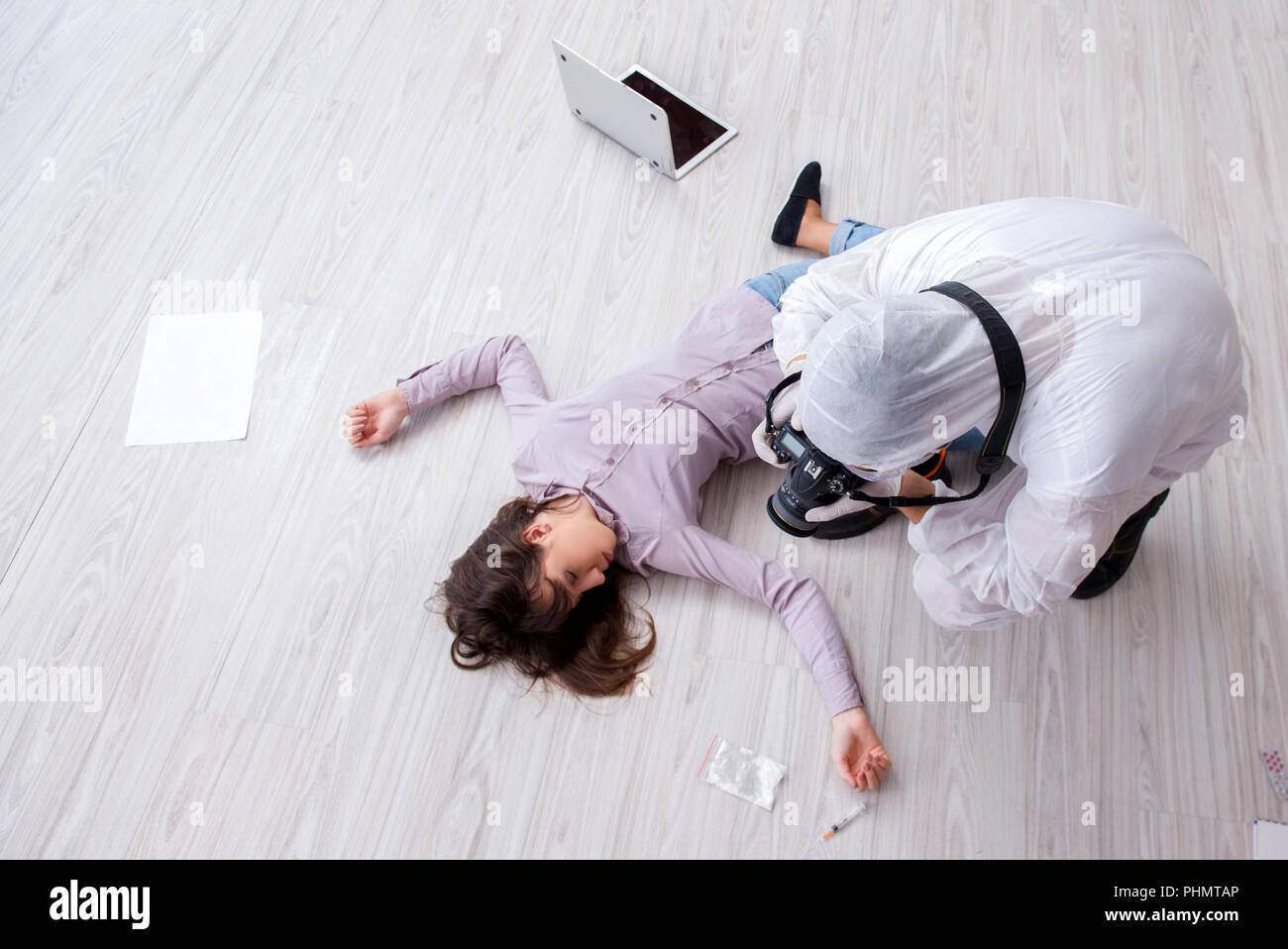 Forensic Investigator At The Crime Scene Investigating Woman Mur Stock