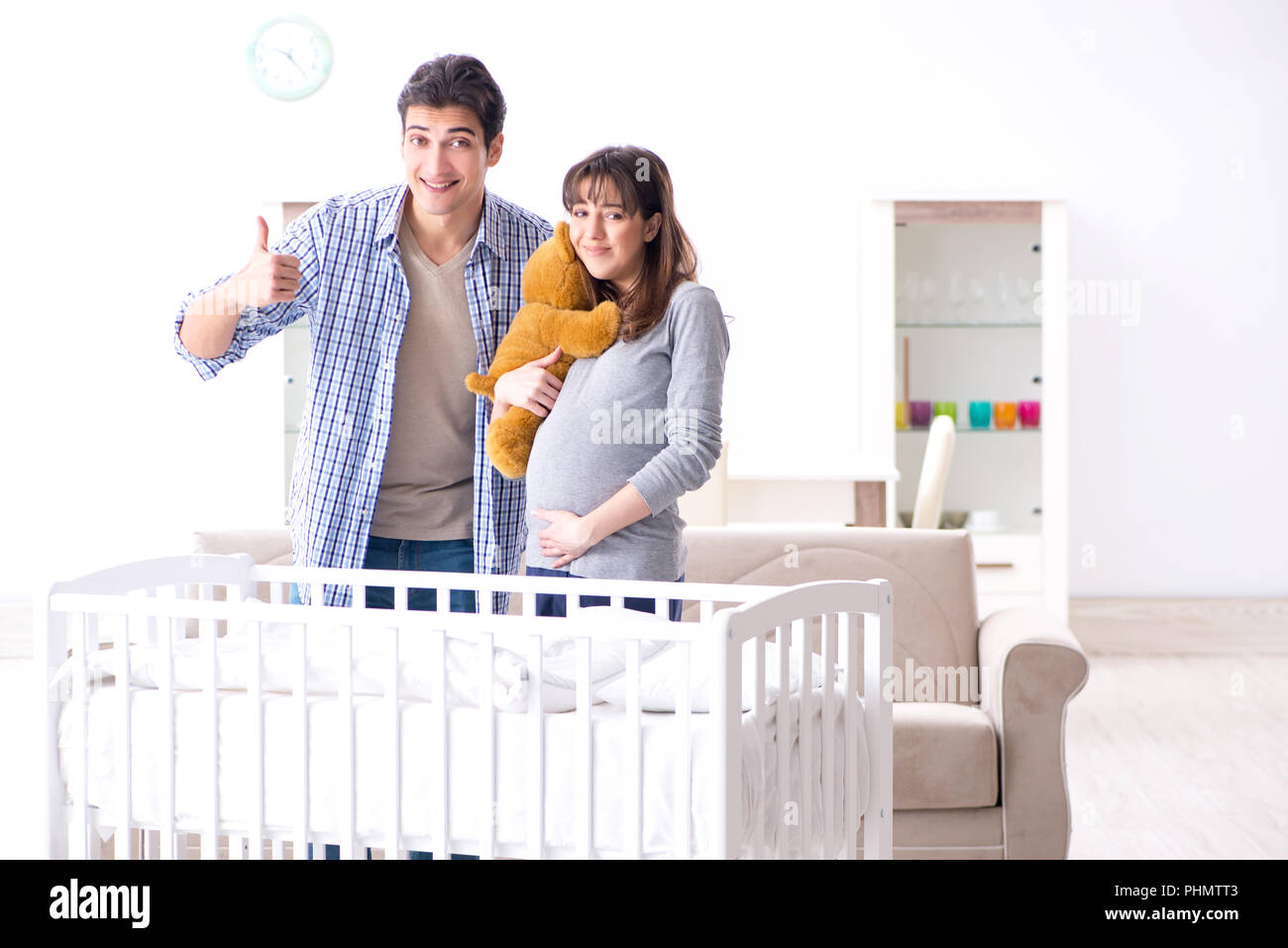 Young parents expecting their first baby Stock Photo - Alamy