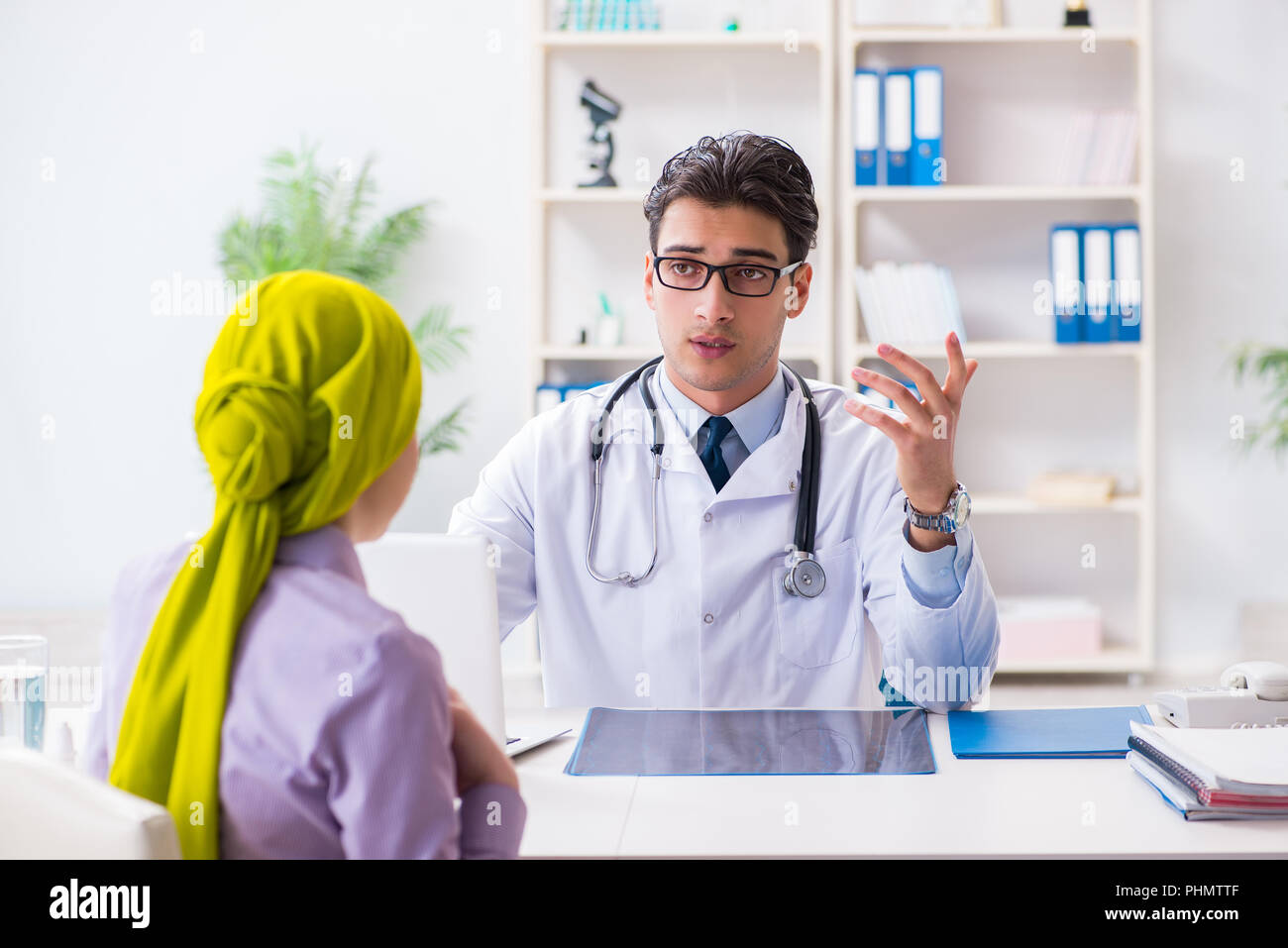 Doctor cancer woman listening hi-res stock photography and images - Alamy