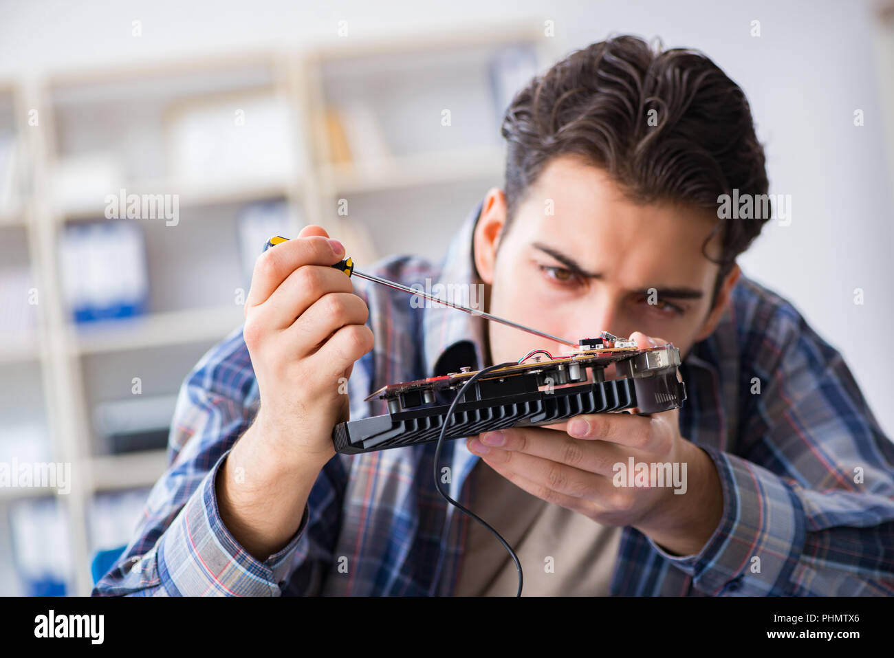 Computer hardware repair and fixing concept by experienced techn Stock ...