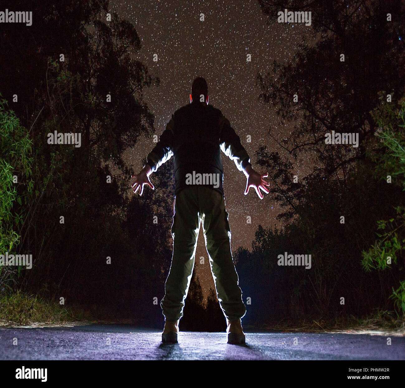 Man standing against starry sky hi-res stock photography and images - Alamy