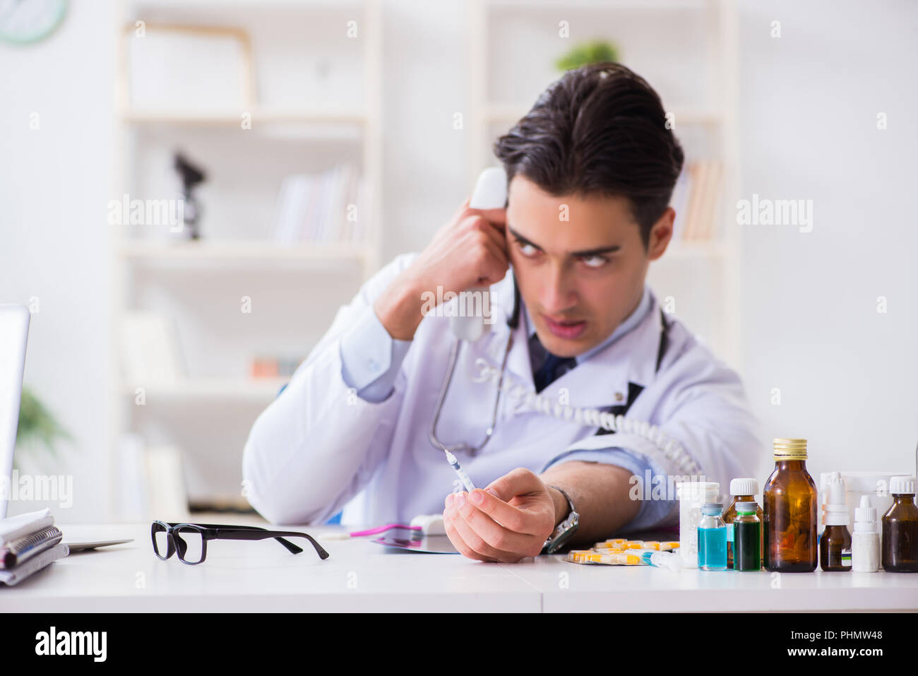 Doctor drug addict in the hospital Stock Photo - Alamy