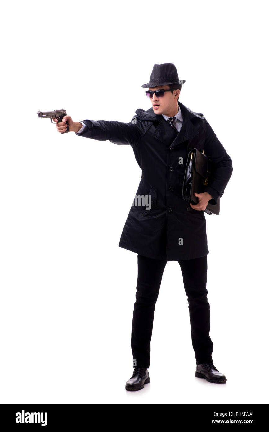 Man spy with handgun isolated on white background Stock Photo - Alamy