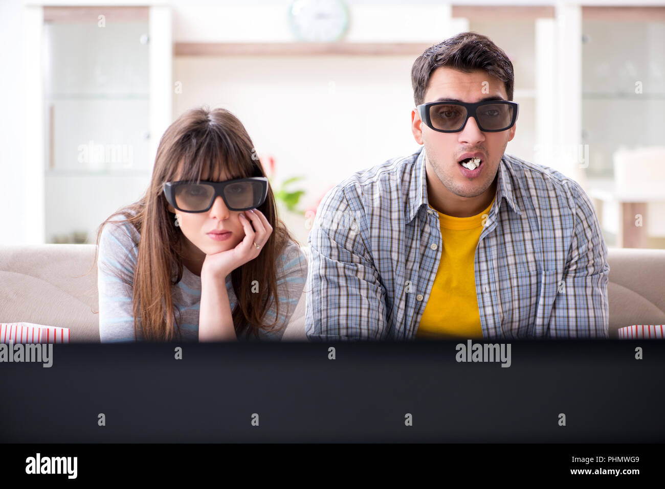 Woman glasses watching tv show hi-res stock photography and images - Alamy