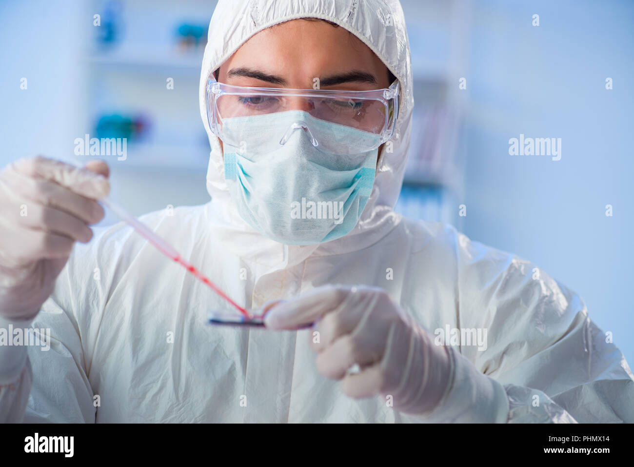 Lab assistant testing blood samples in hospital Stock Photo - Alamy
