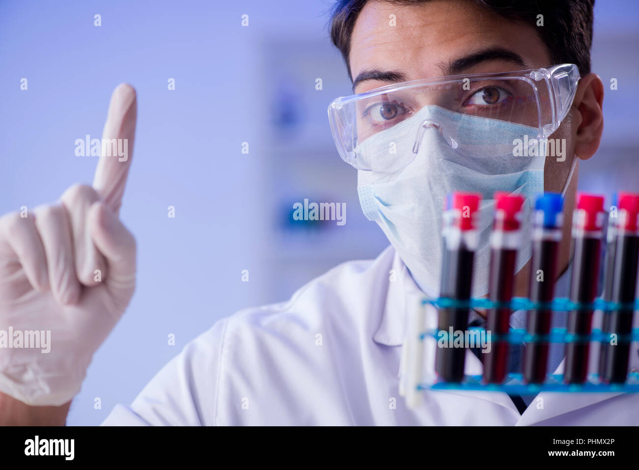 Lab assistant testing blood samples in hospital Stock Photo - Alamy