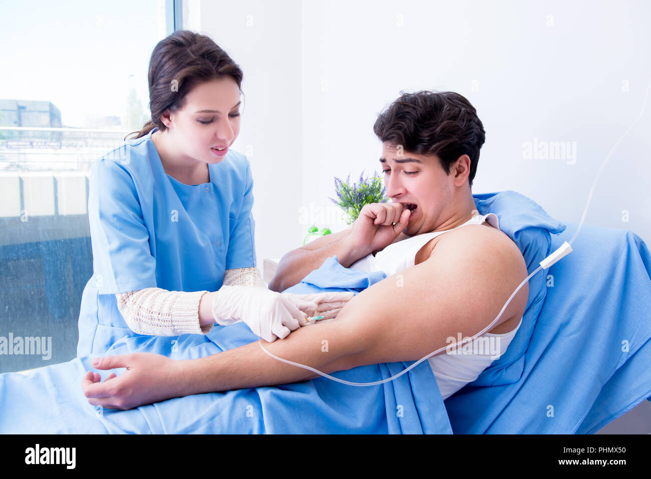 Doctor doing medical injection in hospital room Stock Photo - Alamy