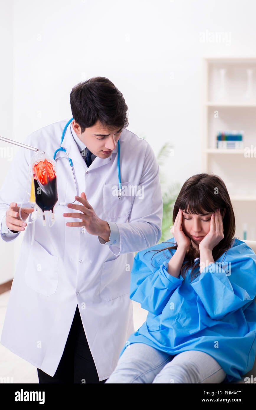 Doctor discussing blood transfusion with patient Stock Photo - Alamy