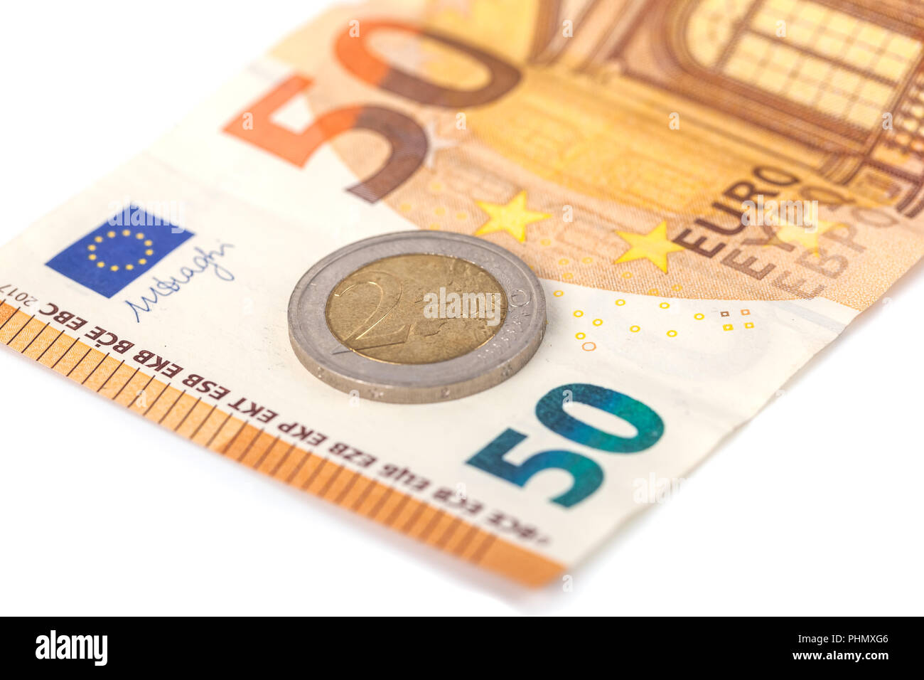 Stack of Euro banknotes and coins isolated. 50 Euro banknot Stock Photo ...