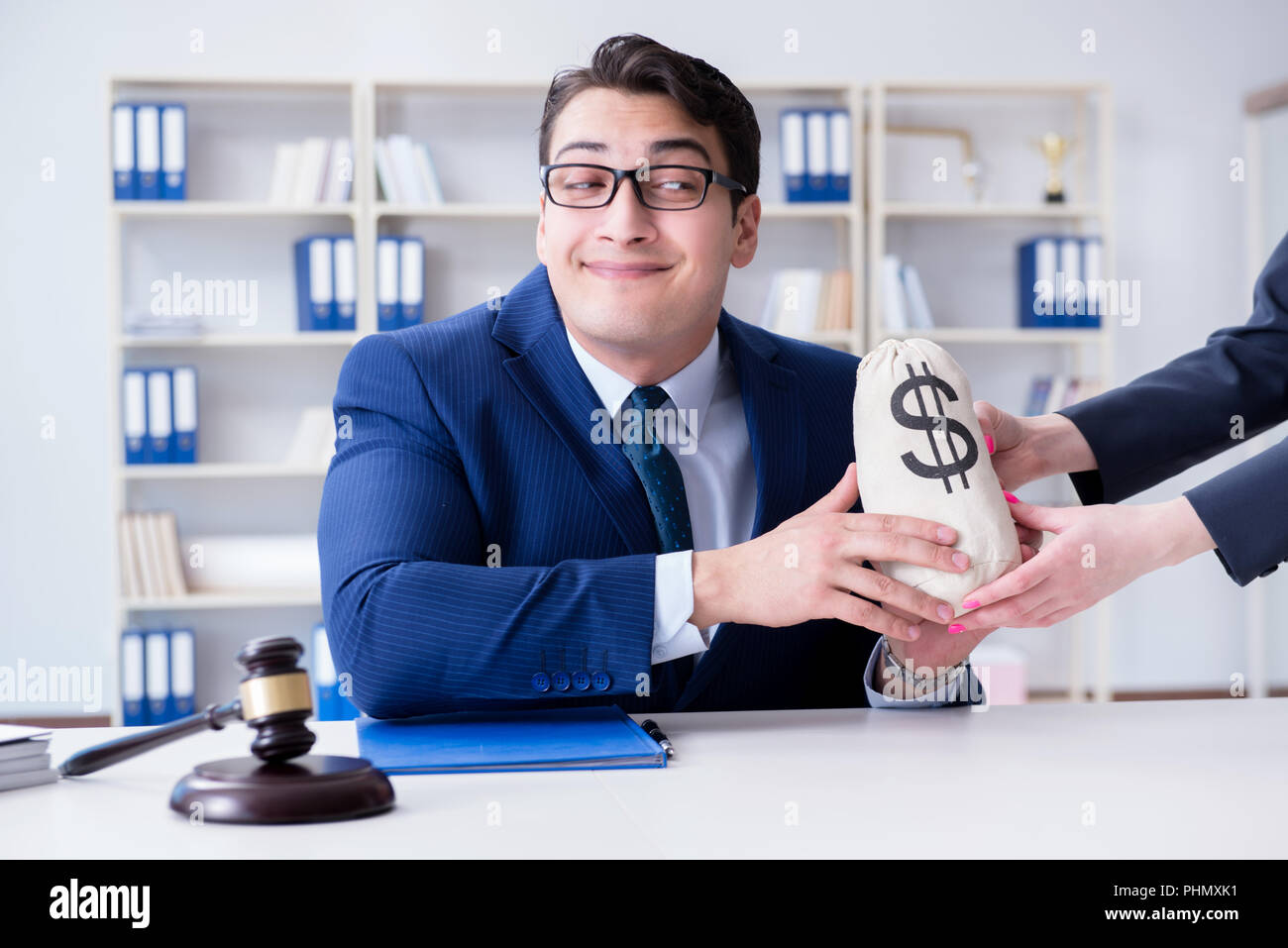 Judge in bribe concept with money Stock Photo - Alamy