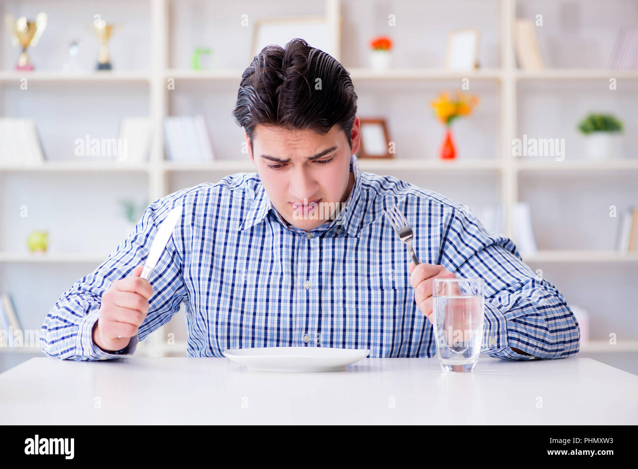 Man on diet waiting hi-res stock photography and images - Alamy