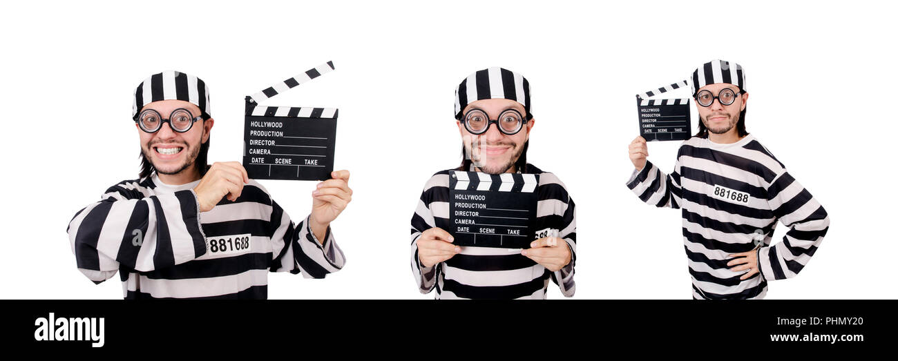 Funny prison inmate with movie board isolated on white Stock Photo - Alamy
