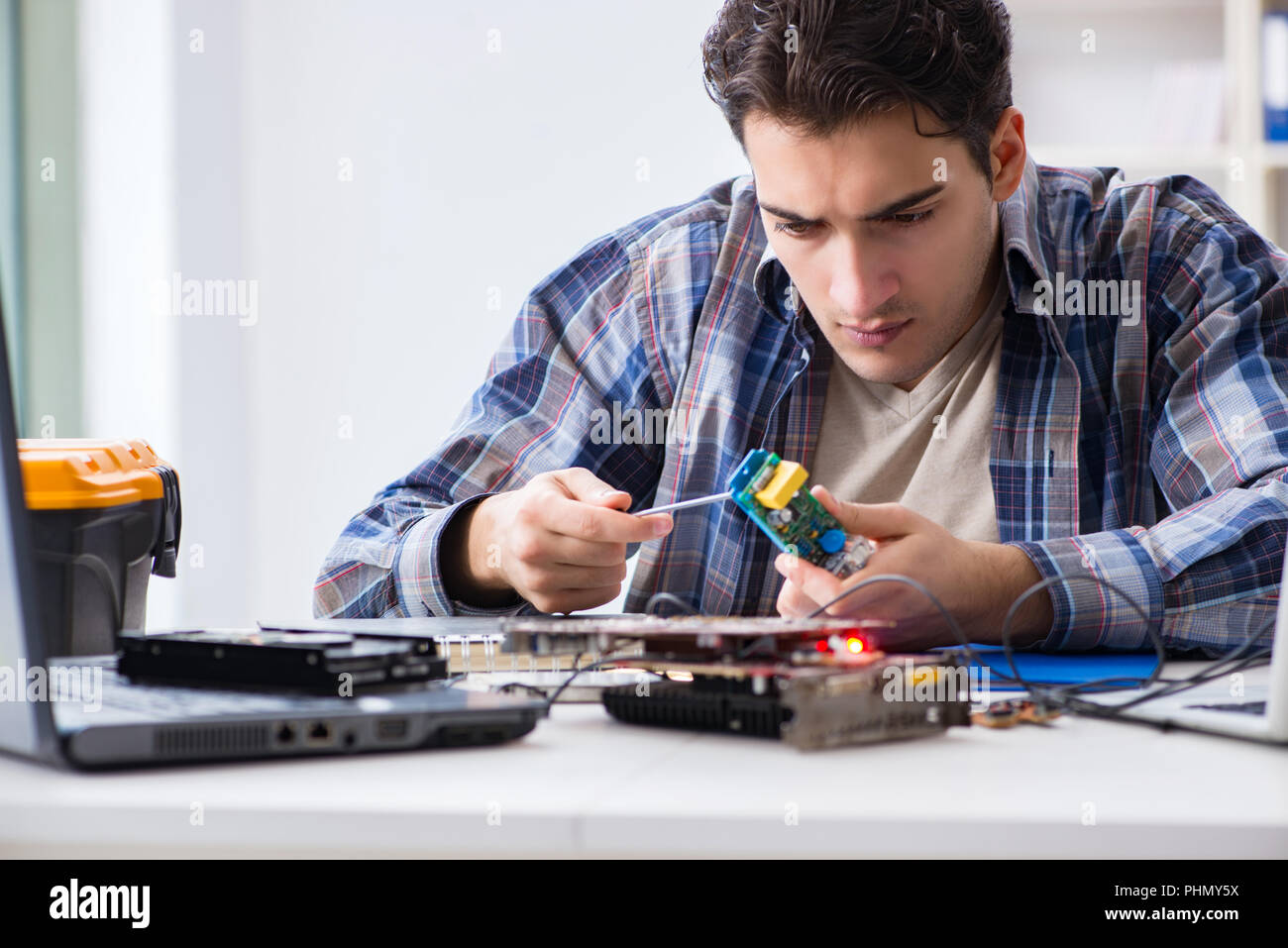 Computer repair concept tweezers hi-res stock photography and images ...