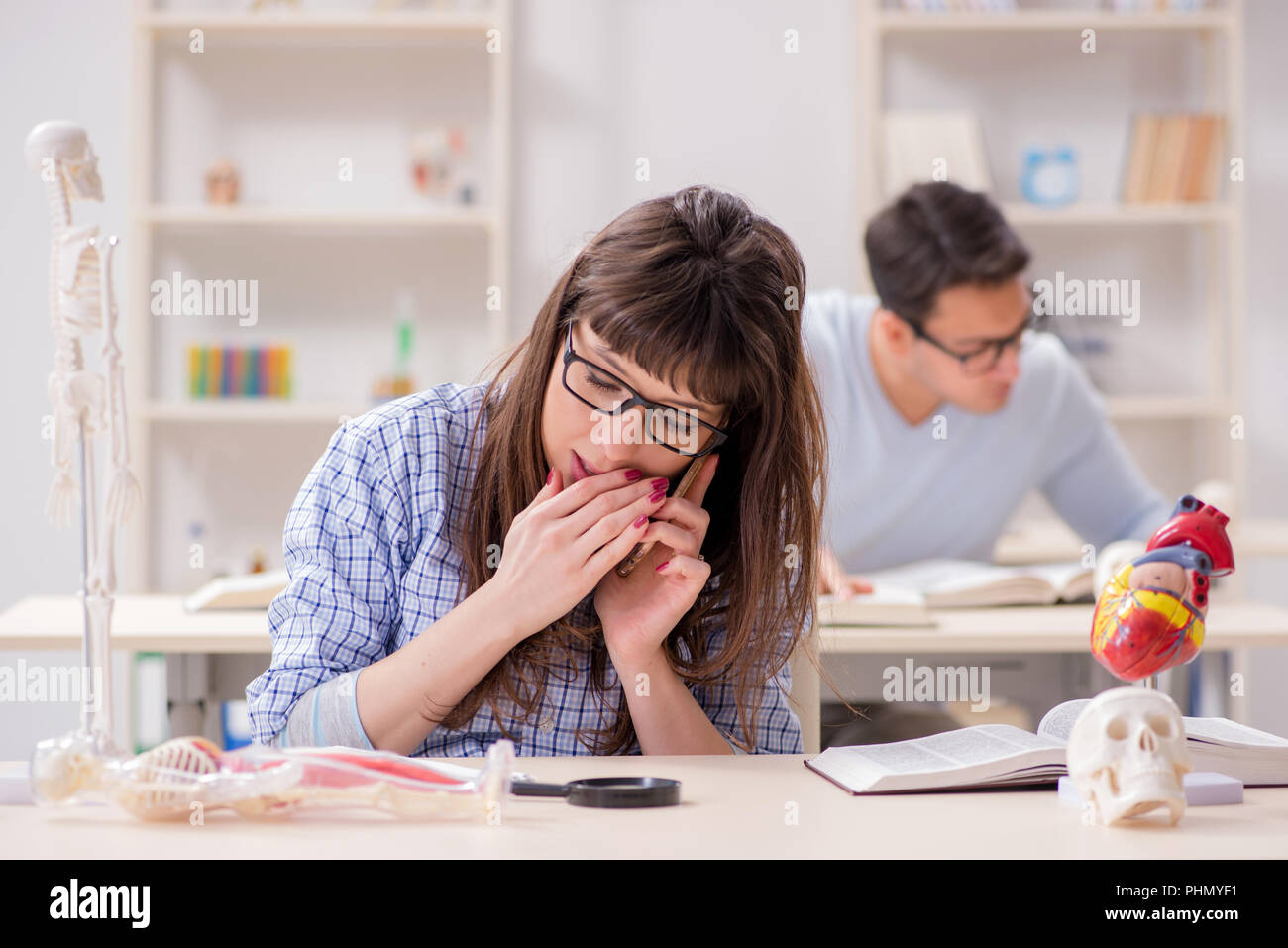 Two medical students studying in classroom Stock Photo - Alamy