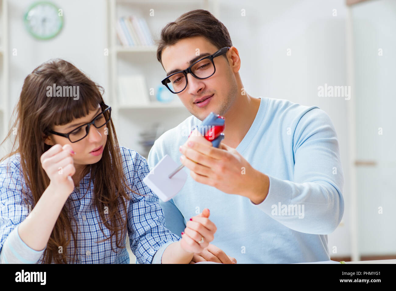Two medical students studying in classroom Stock Photo - Alamy